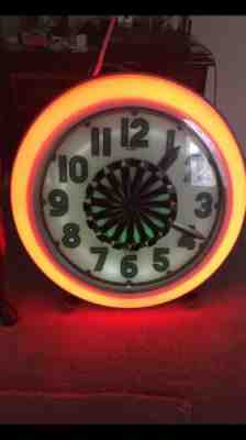 Vintage neon clock. Electric Neon Clock Company Pinwheel illusion ...