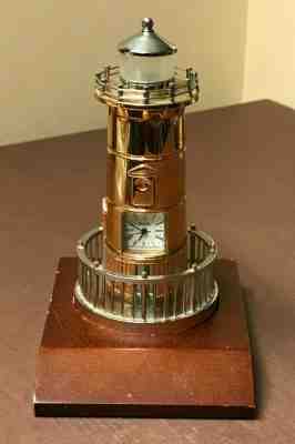Bulova Jeffrey's Hook Lighthouse Miniature Clock B0436 - Sold for $99.00 | clocks Price Reference