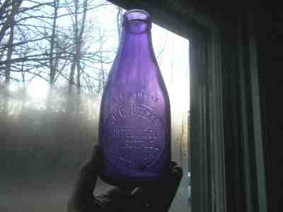 J.G.UECKE SANITARY DAIRY PASTEURIZED IN BOTTLE 1912 AMETHYST OSHKOSH ...